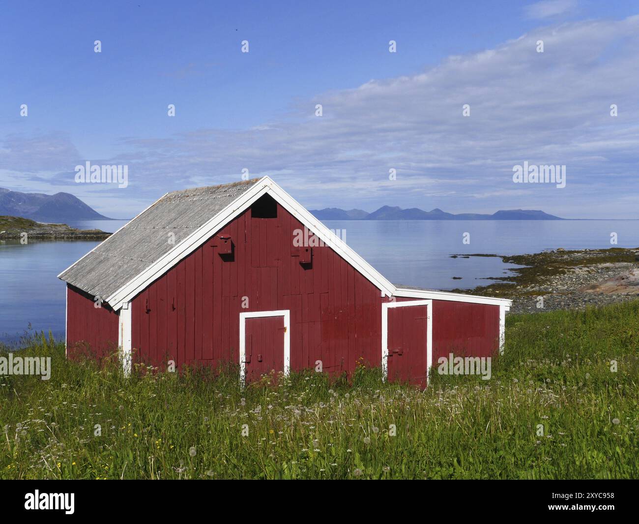Wooden hut by the fjord in northern Norway Stock Photo - Alamy
