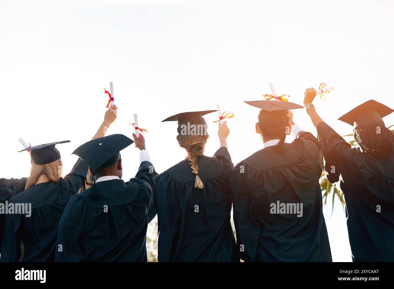 Graduation, diploma or back of students with certificate at university ...
