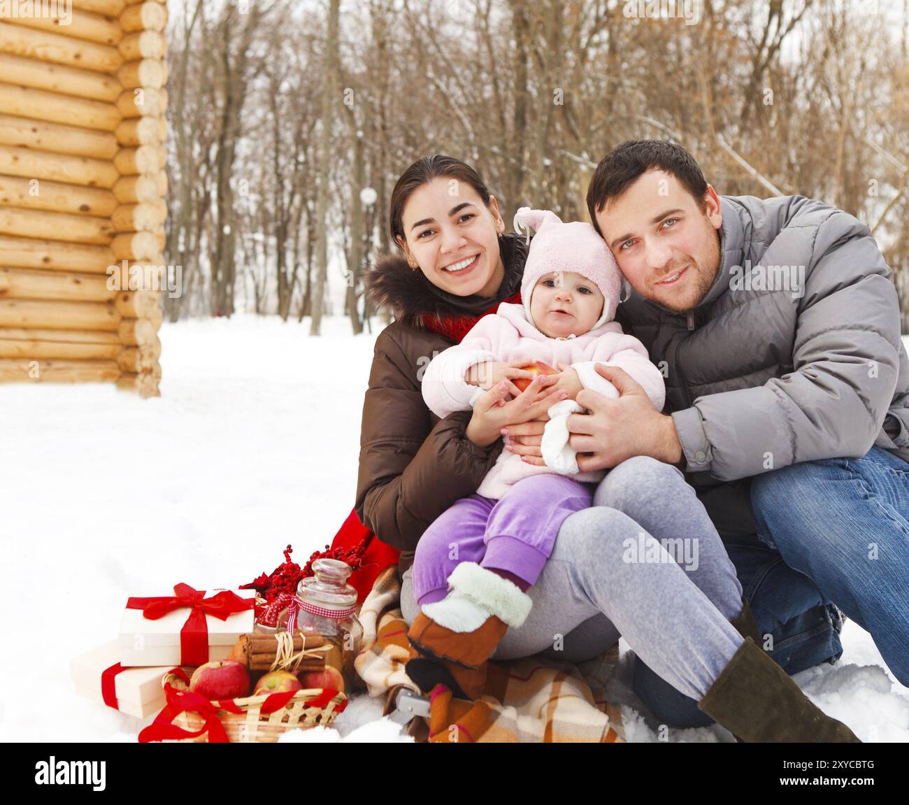 Happy smiling family with at the winter picnic outdoors Stock Photo - Alamy