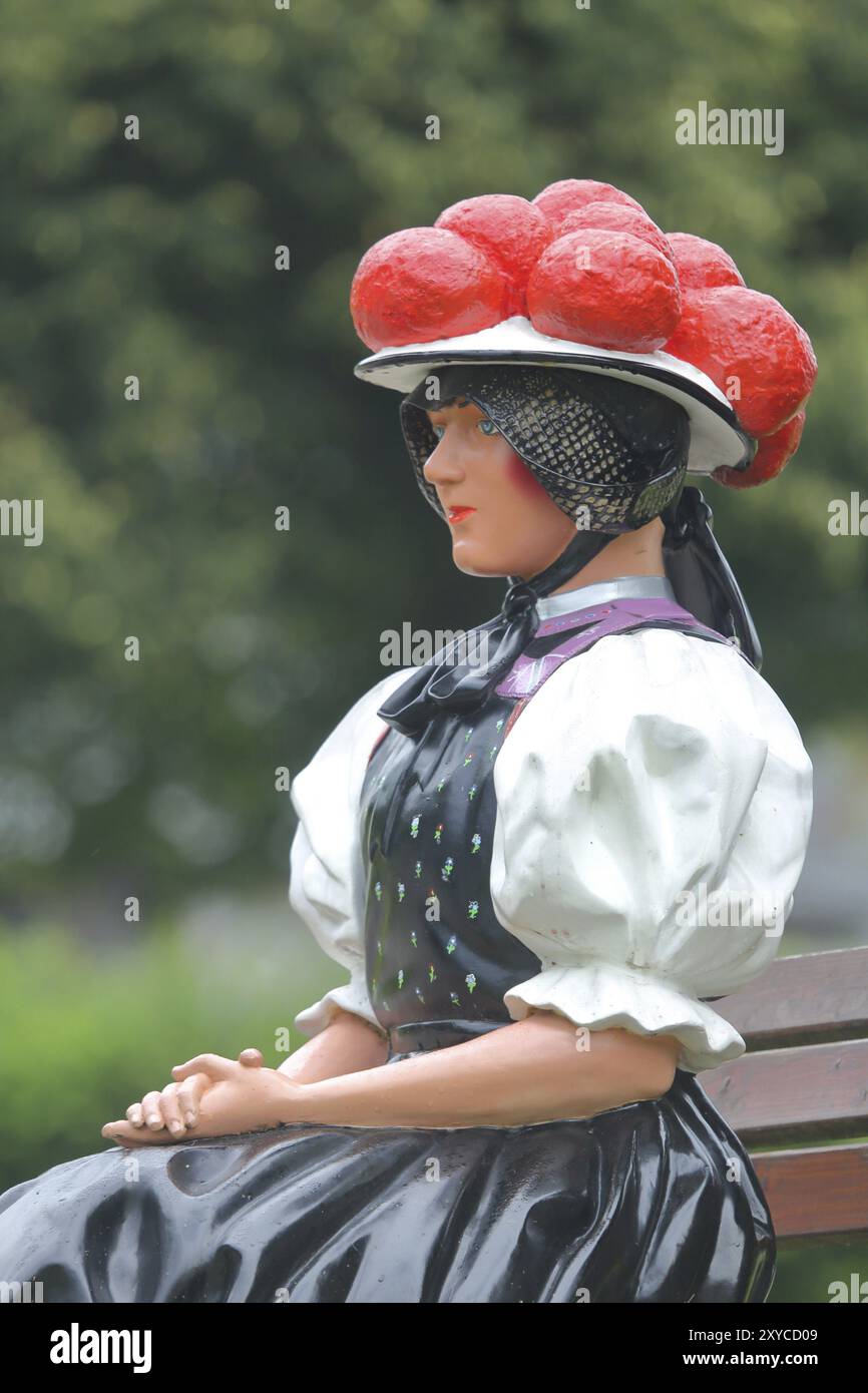 Two figures in traditional attire sit in hi-res stock photography and ...