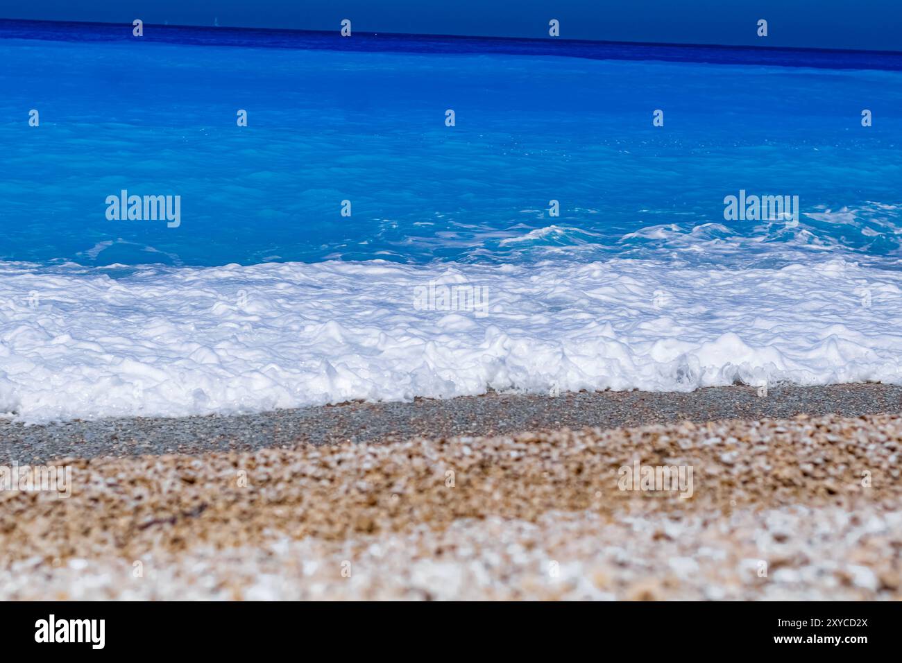 Sand and sea waves hi-res stock photography and images - Alamy