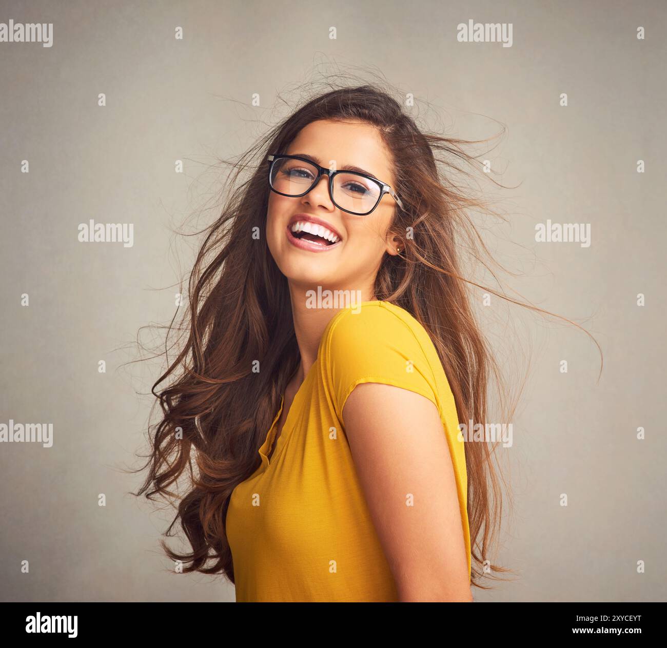 Studio, laugh and portrait of woman with glasses, confidence and ...