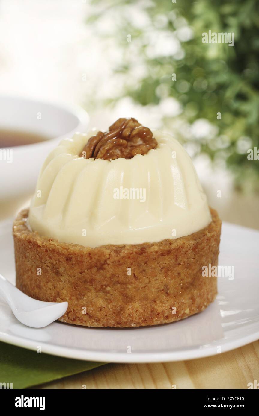 Walnut cake decorated with a cream with coffee Stock Photo - Alamy