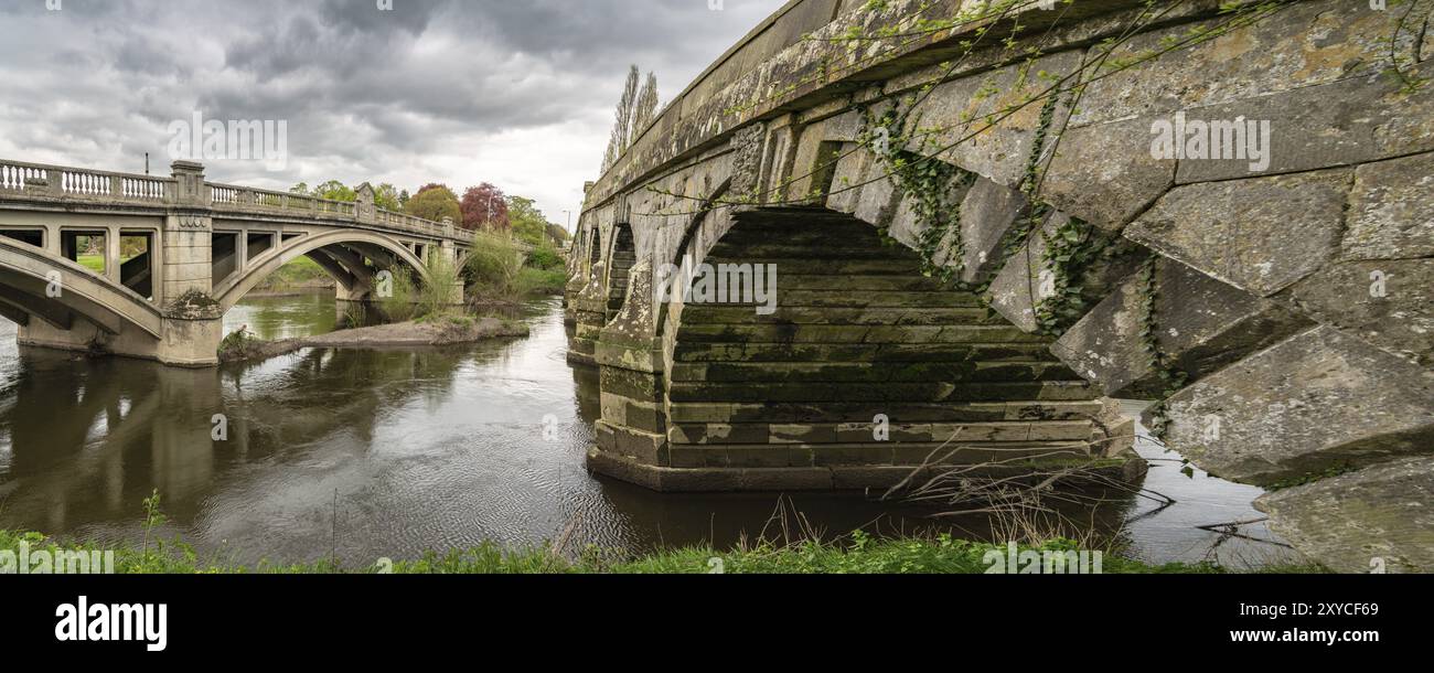 The old bridge and Atcham Bridge over the River Severn in Atcham, near ...