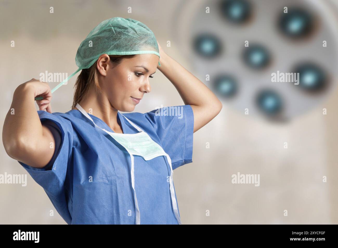 Young female surgeon getting ready for a surgery Stock Photo - Alamy