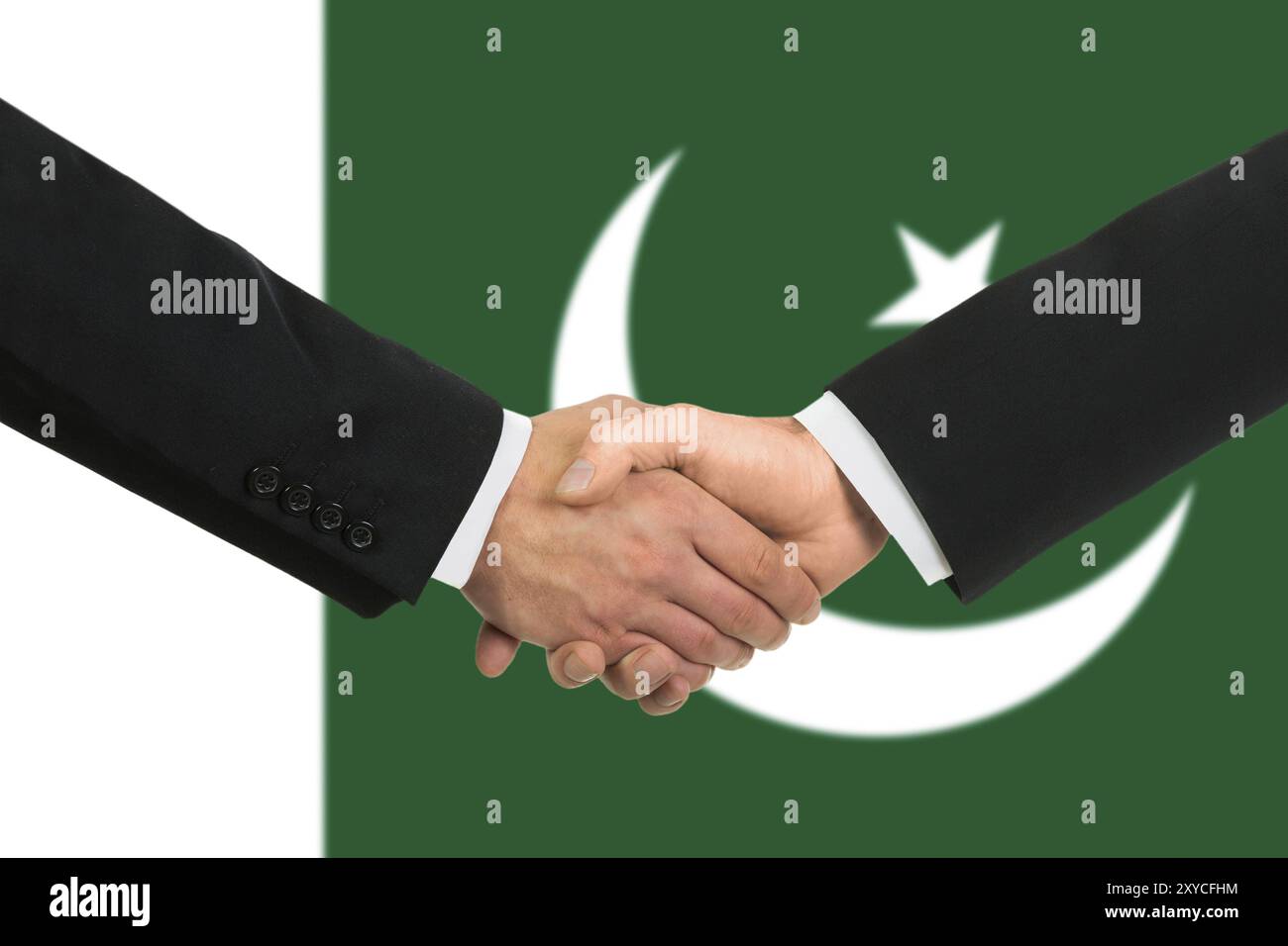 The Pakistani flag and business handshake Stock Photo - Alamy