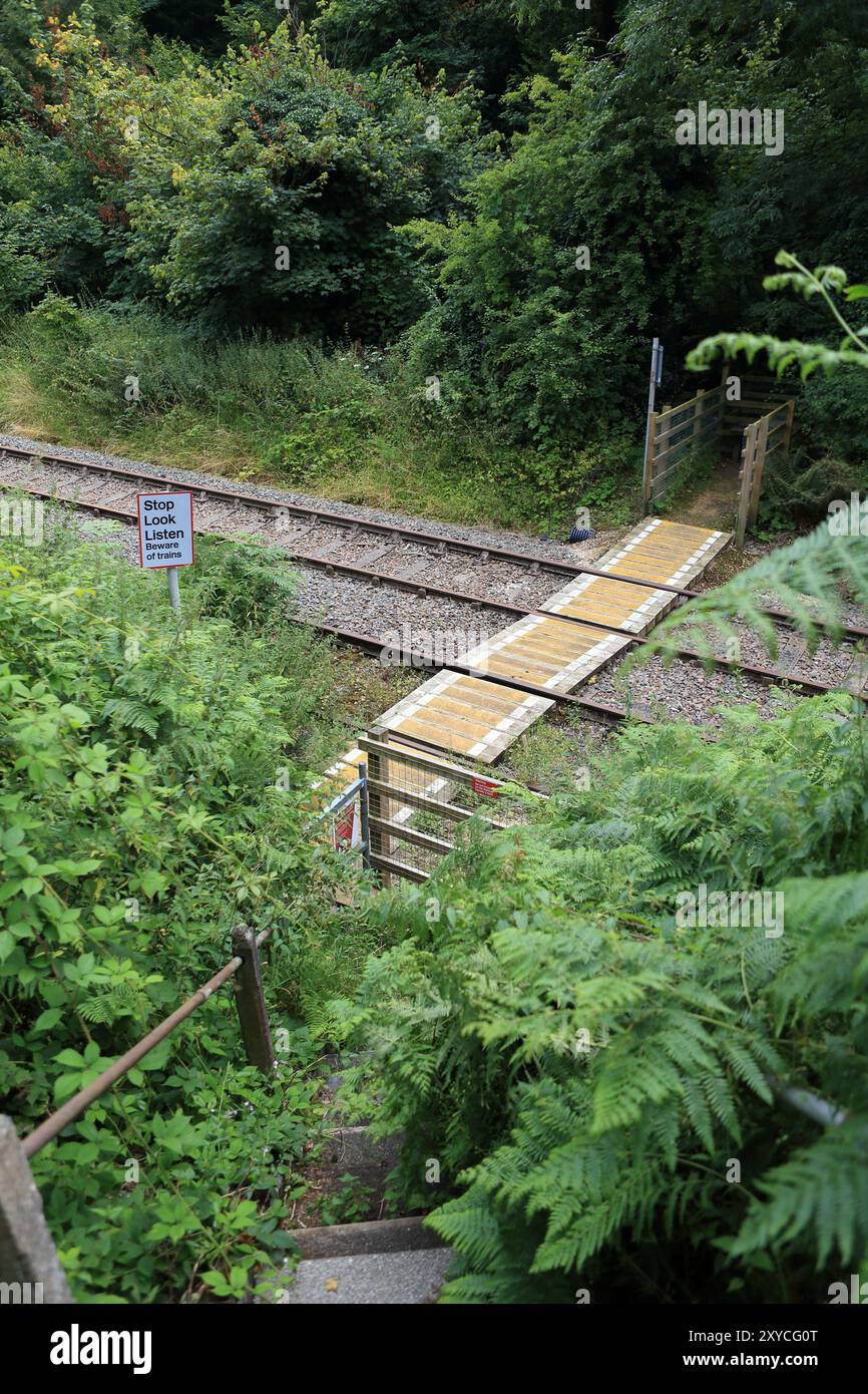 Pedestrian railway crossing walkway across railway tracks foot crossing ...