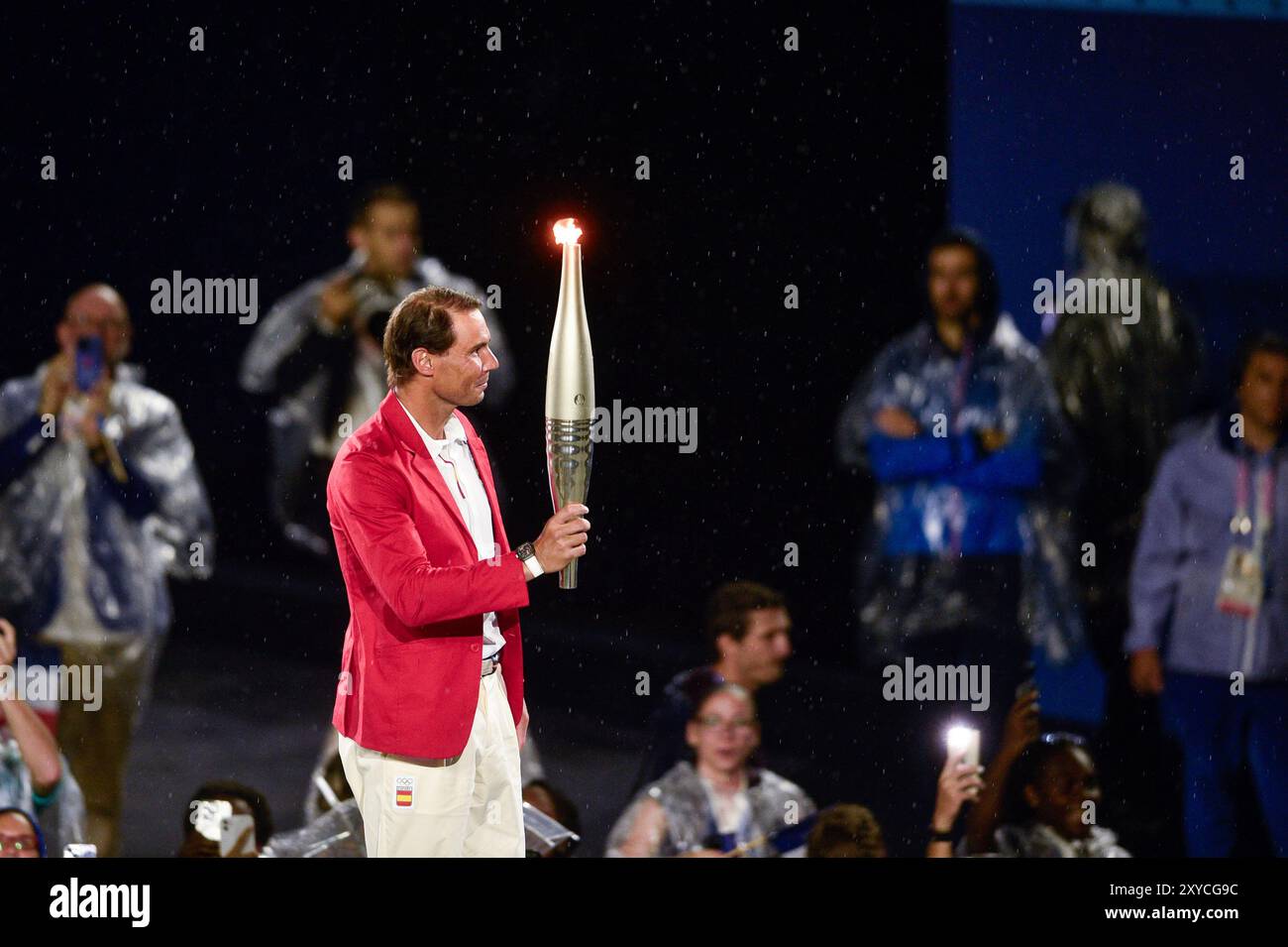 PARIS, FRANCE-26 July 2024: Rafael Nadal of Team Spain holds aloft the ...