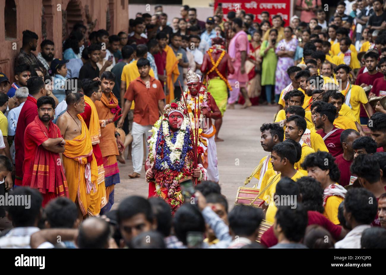 GUWAHATI, INDIA, AUGUST 19: Priests dance in the beat of Dhol (Drum ...