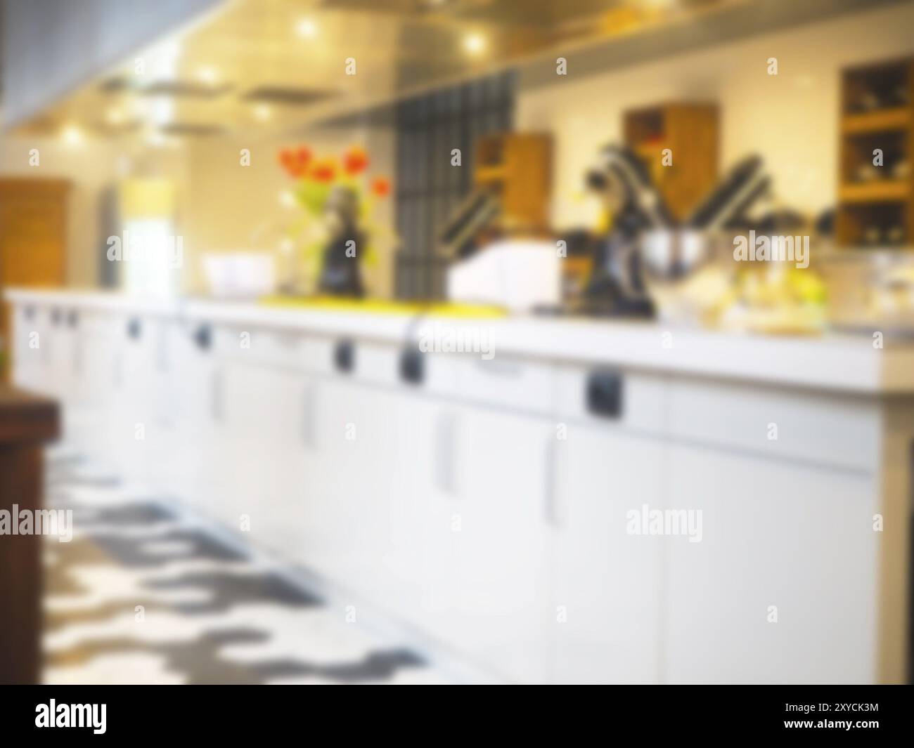 Blurred kitchen interior background with working place Stock Photo - Alamy