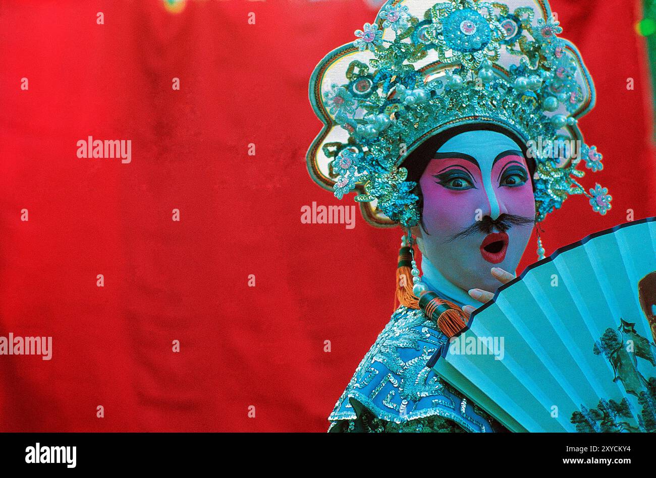 Singapore. Chinese Opera female performer close up with fan Stock Photo ...