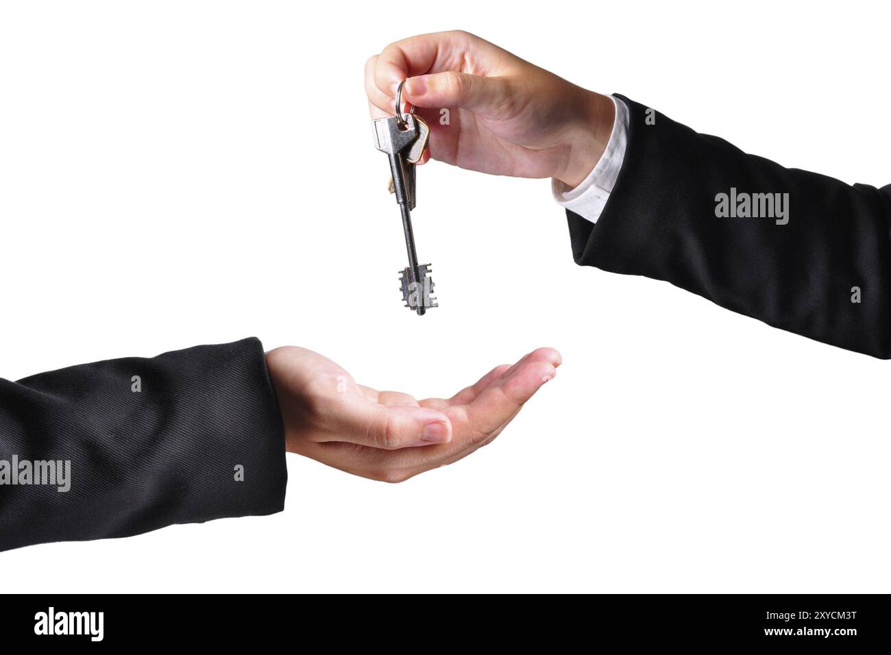 A hand giving a key to another hand. Both persons in suits. Isolated ...