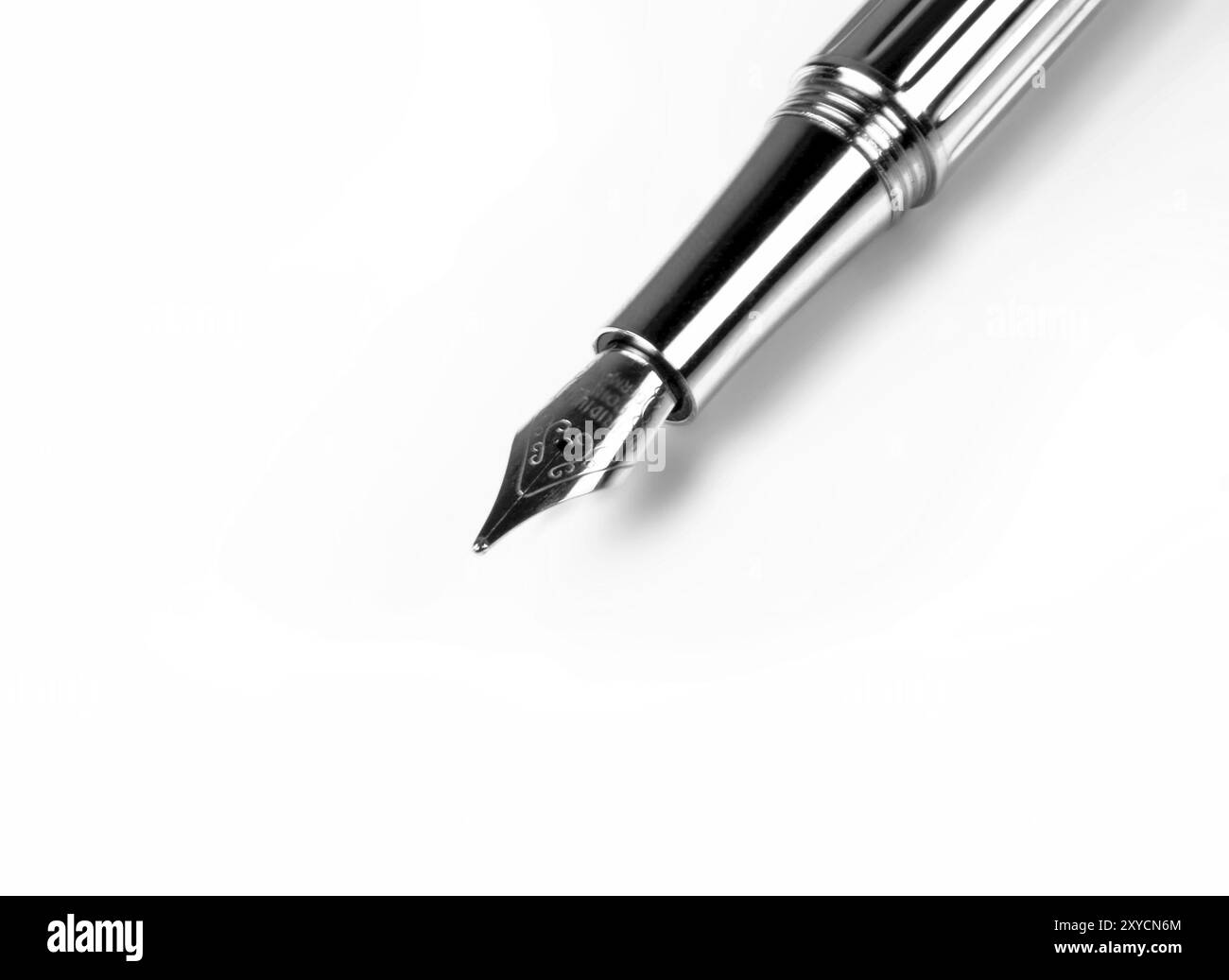 Fountain writing pen isolated on white background Stock Photo - Alamy