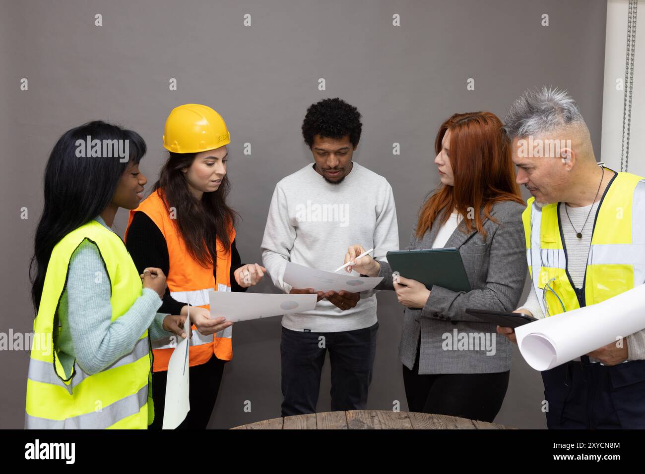 Group engineers architects foreman construction hi-res stock ...