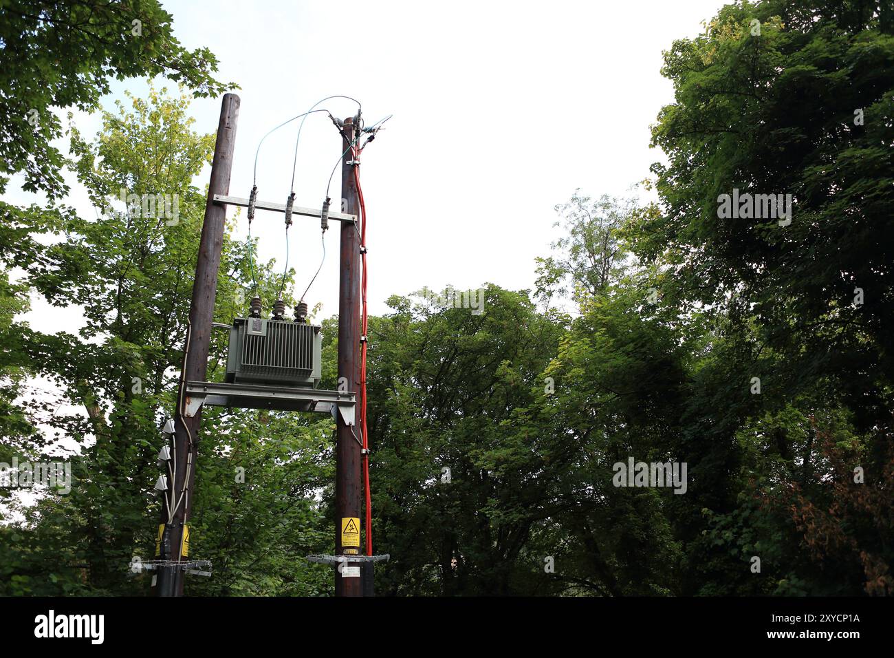 Electrical power lines and transformer on wooden telegraph poles Stock ...