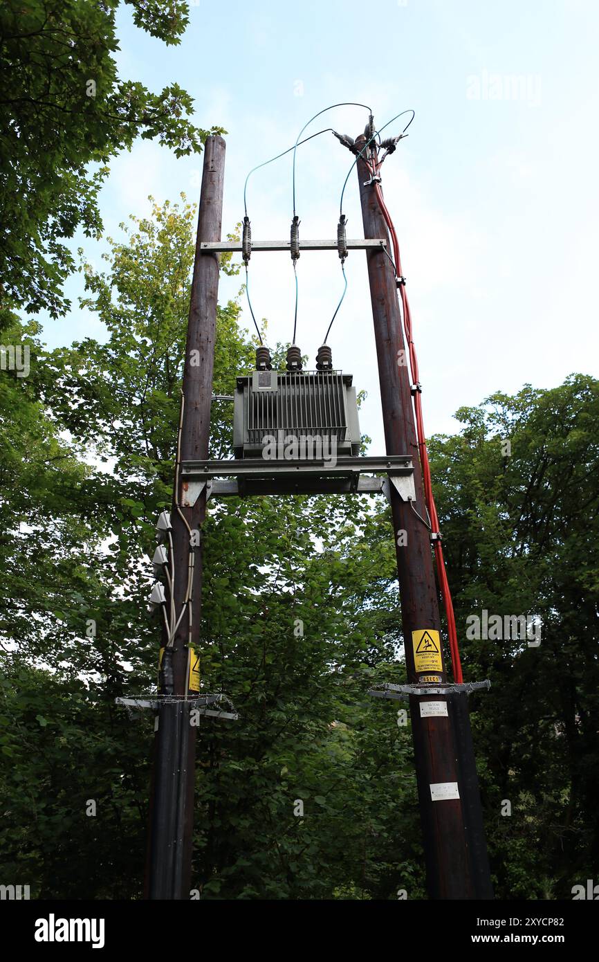 Electrical power lines and transformer on wooden telegraph poles Stock ...