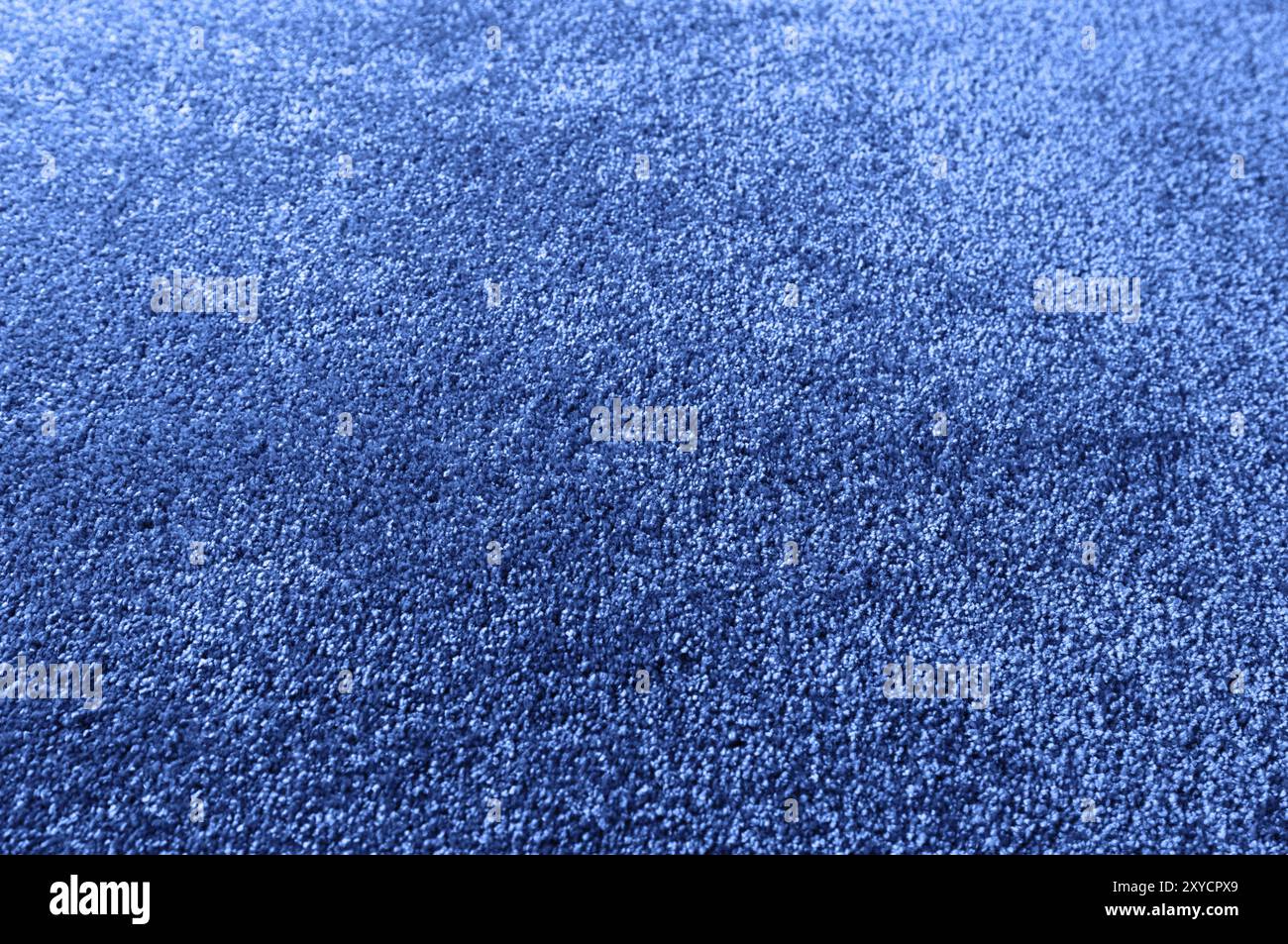 Classic blue carpet texture close up, indoors interior design, color ...