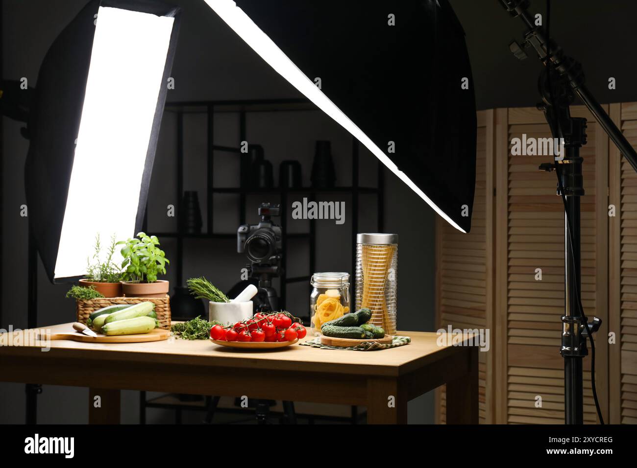 Shooting food in photo studio with professional lighting equipment ...