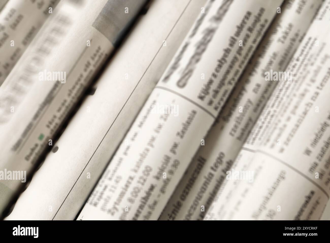 Many newspapers in different languages as background, closeup Stock ...