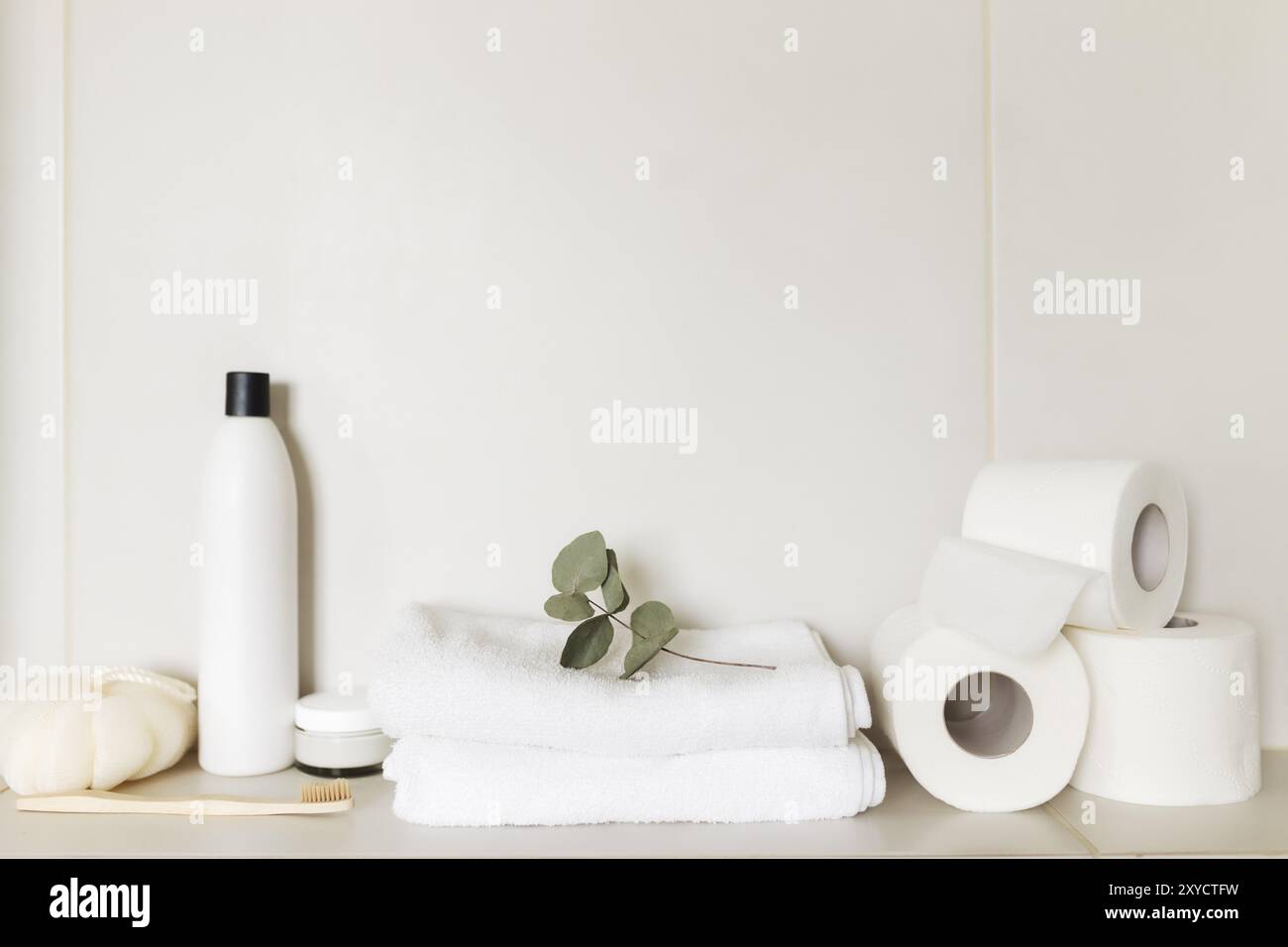Washbasin in white bathroom with bath accessories. Hotel cleaning ...