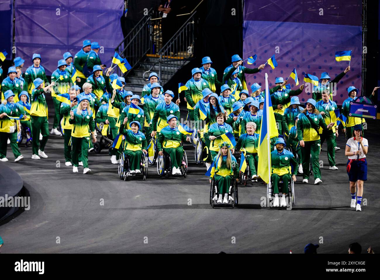 Paris, France. 28th Aug, 2024. The Ukraine team walks across the Place ...