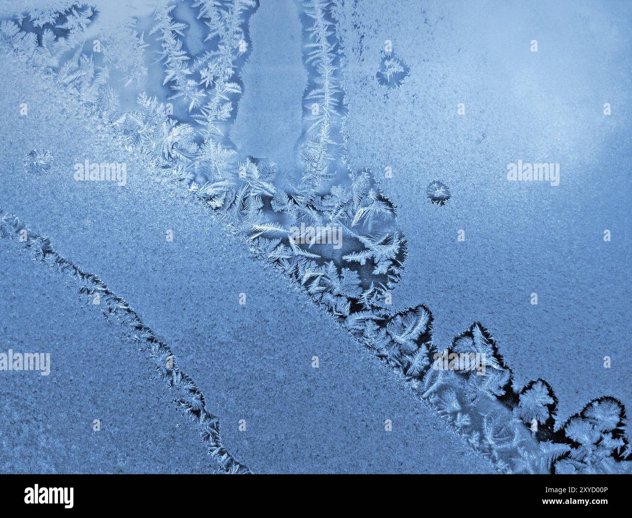 Natural ice pattern on winter window glass Stock Photo - Alamy