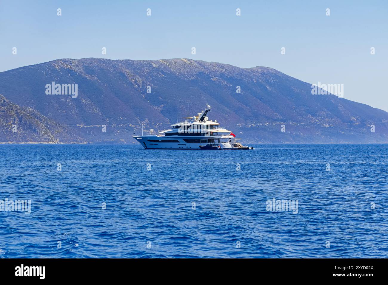 Blue sail yacht on sea hi-res stock photography and images - Alamy