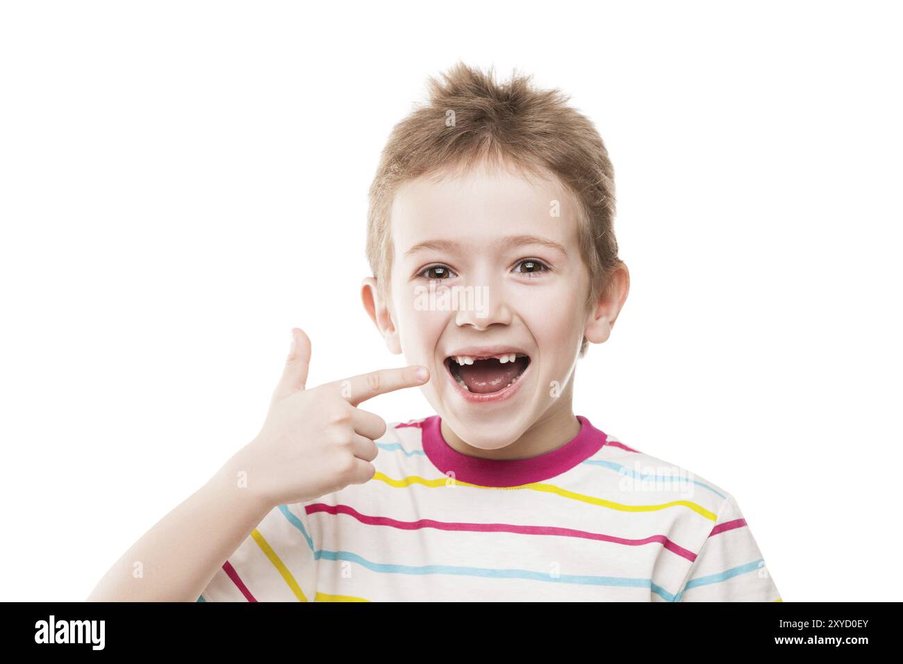 Little smiling child boy hand pointing his first baby milk or temporary ...