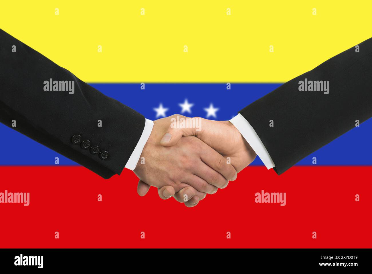 The Venezuelan flag and business handshake Stock Photo - Alamy