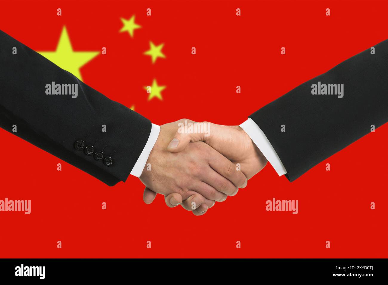 The Chinese flag and business handshake Stock Photo - Alamy