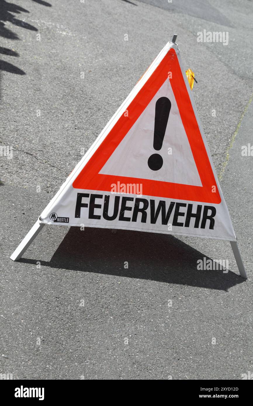 Fire brigade warning sign Stock Photo - Alamy
