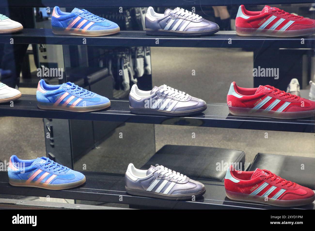 Adidas Samba and Gazelle trainers on display in a shop window Stock ...