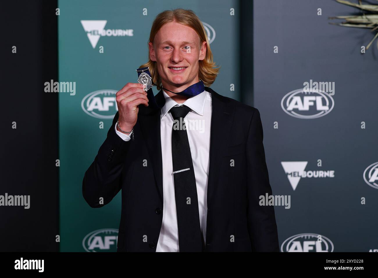 Melbourne, Australia. 29th Aug, 2024. Oliver Dempsey poses with the ...
