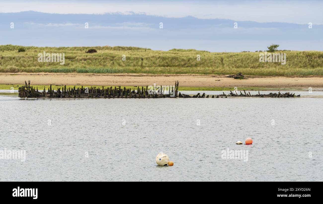 Old Shipwreck on the shore of the River Coquet in Amble, Northumberland ...