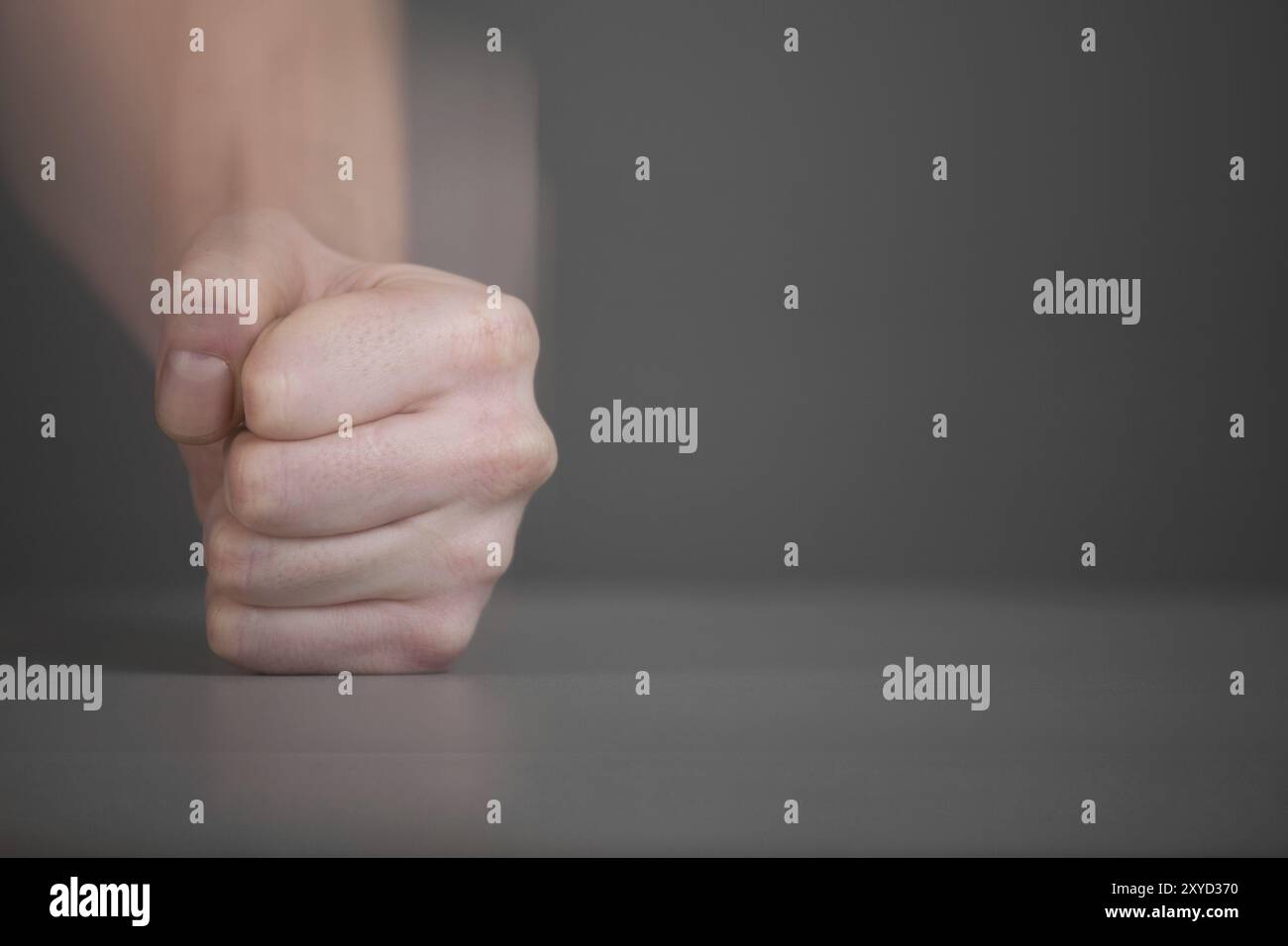 Hitting table with fist hi-res stock photography and images - Alamy