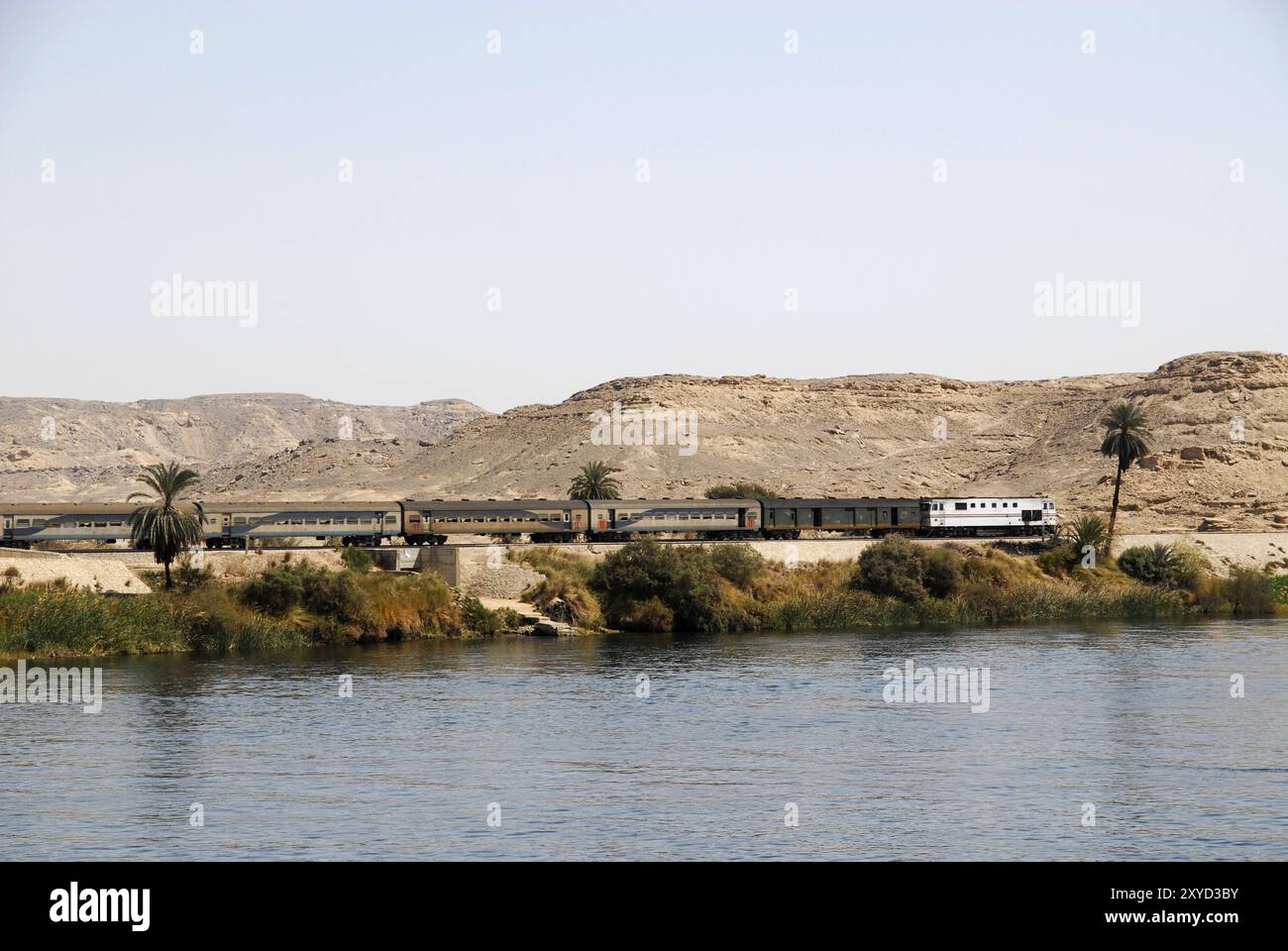 Train next to the river Nile between Luxor and Aswan Stock Photo - Alamy