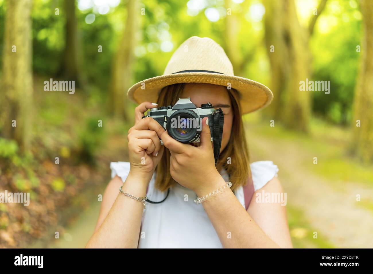 Taking photograph hiding hi-res stock photography and images - Alamy