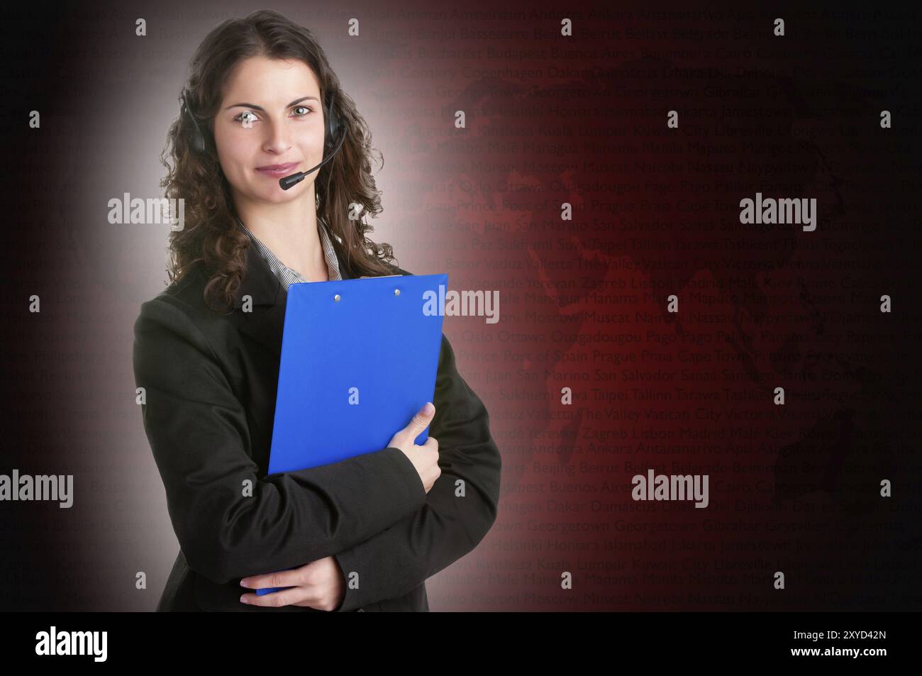 Corporate woman talking over her headset, with a world map in the background Stock Photo - Alamy