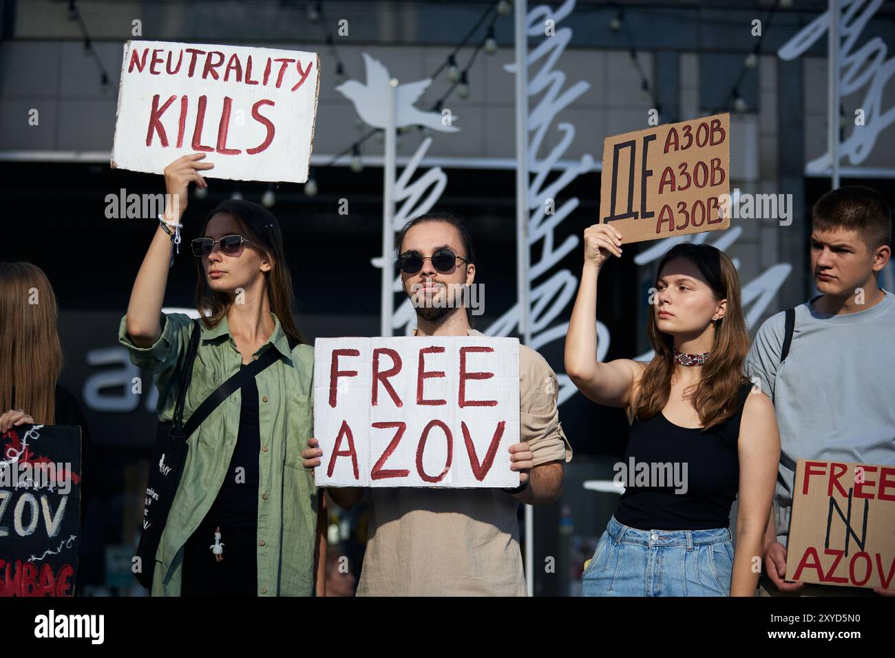 Ukrainian people demonstrating with banners "Neutrality Kills" and ...