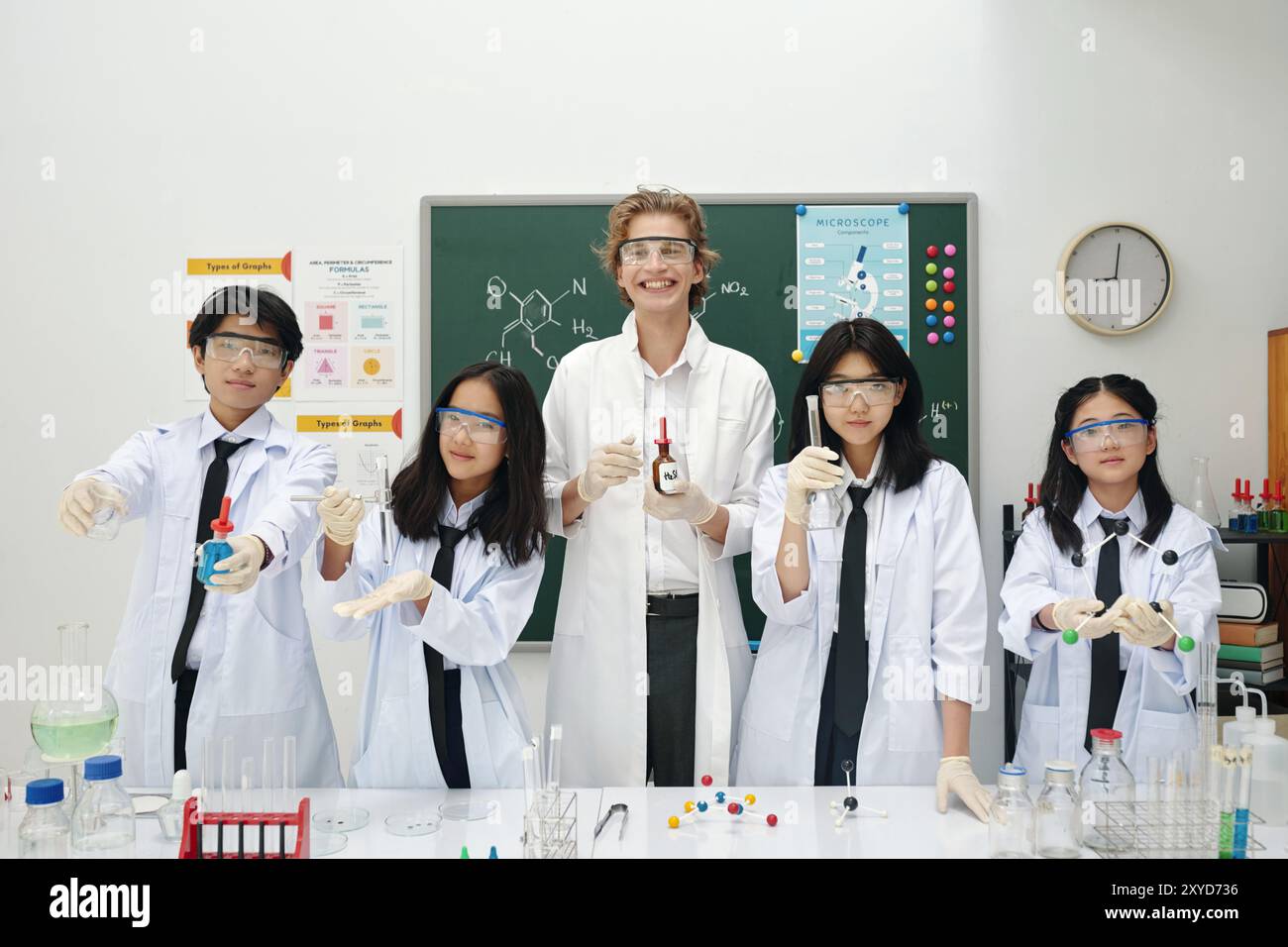 Science teacher performing chemistry experiment hi-res stock ...