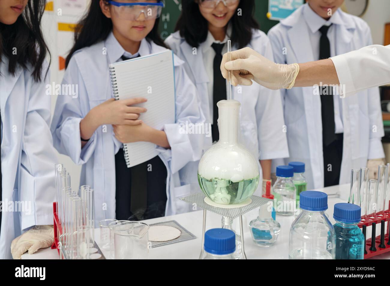 Observing Chemical Experiment in Laboratory Setting Stock Photo - Alamy