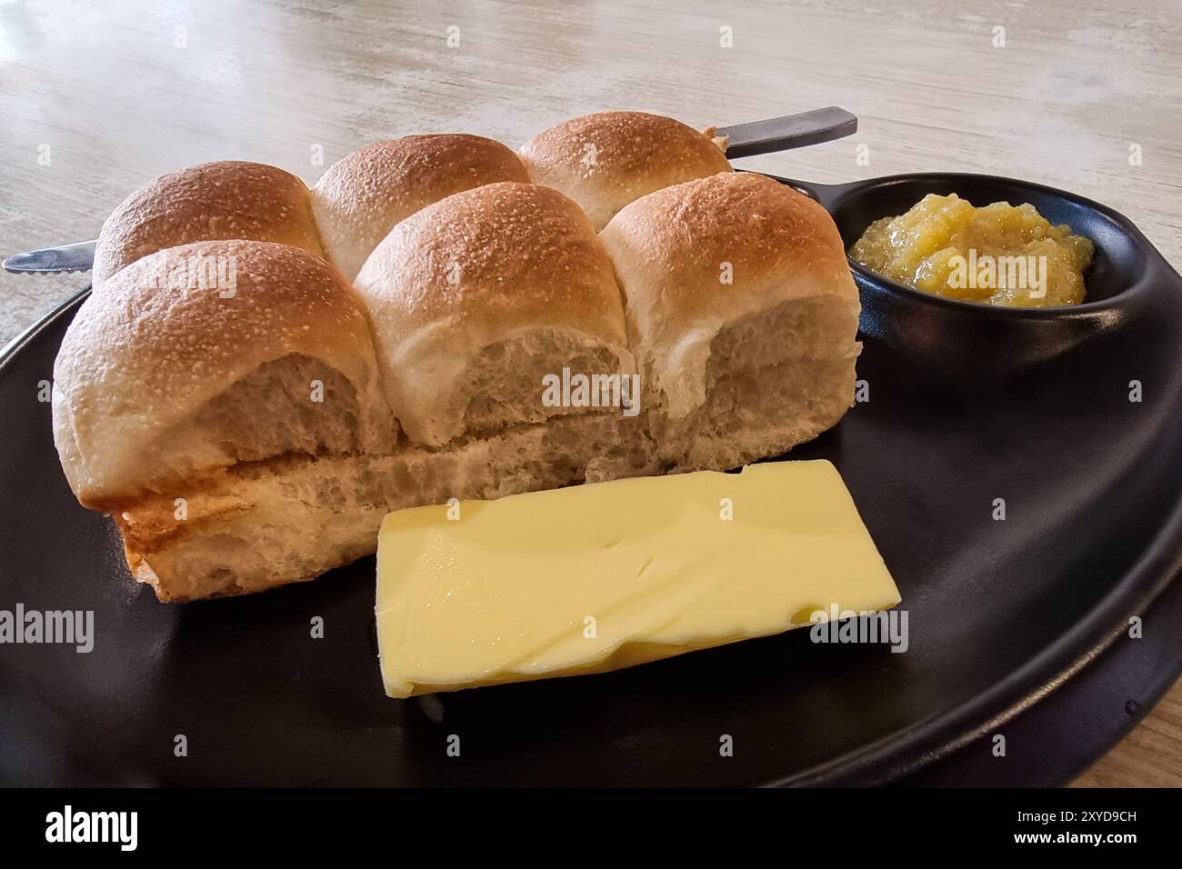 Closeup serving of roti paung or steam bun with butter, popular ...