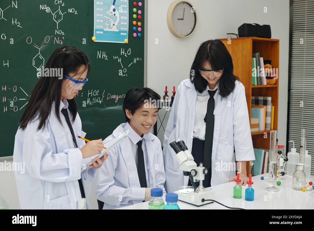 Conducting Experiments in Classroom with Chemistry Students Stock Photo ...