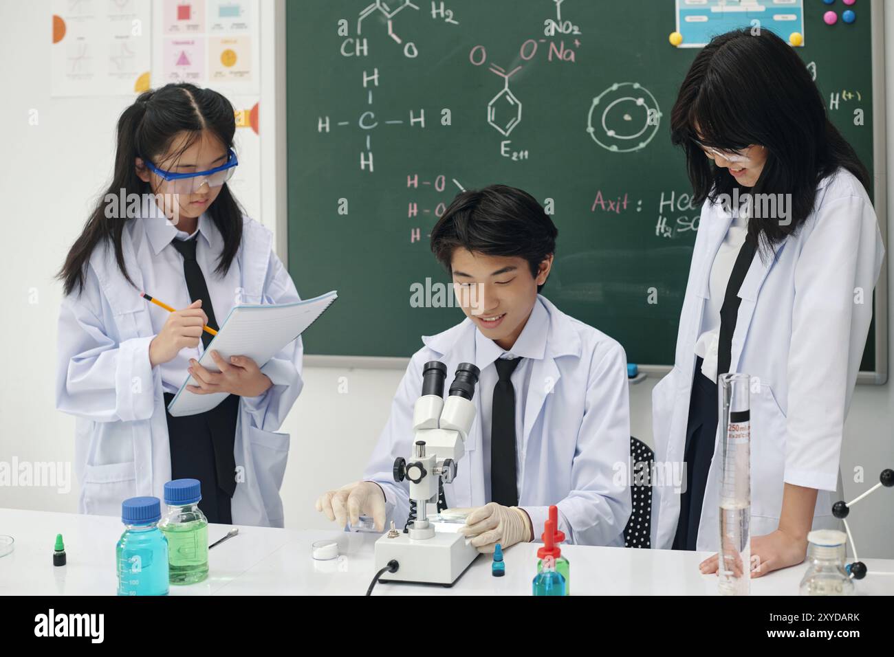 Students Conducting Science Experiment in Laboratory Stock Photo - Alamy