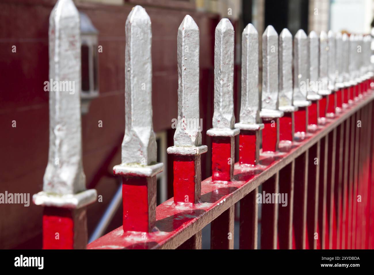 Wrought iron fence with spikes Stock Photo - Alamy