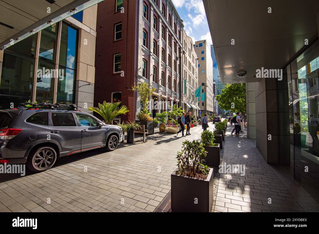 People walking near the Channel and Tiffany & Co buildings with the new ...
