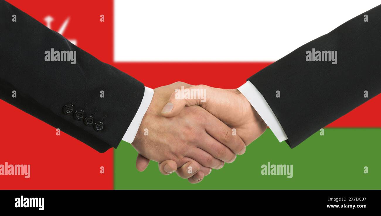 Oman flag hand hi-res stock photography and images - Alamy