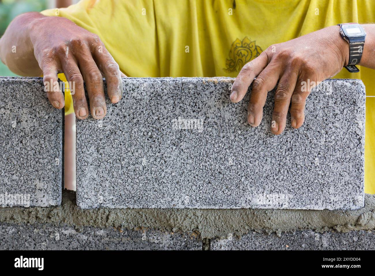 Bricklayer putting down another row hi-res stock photography and images ...