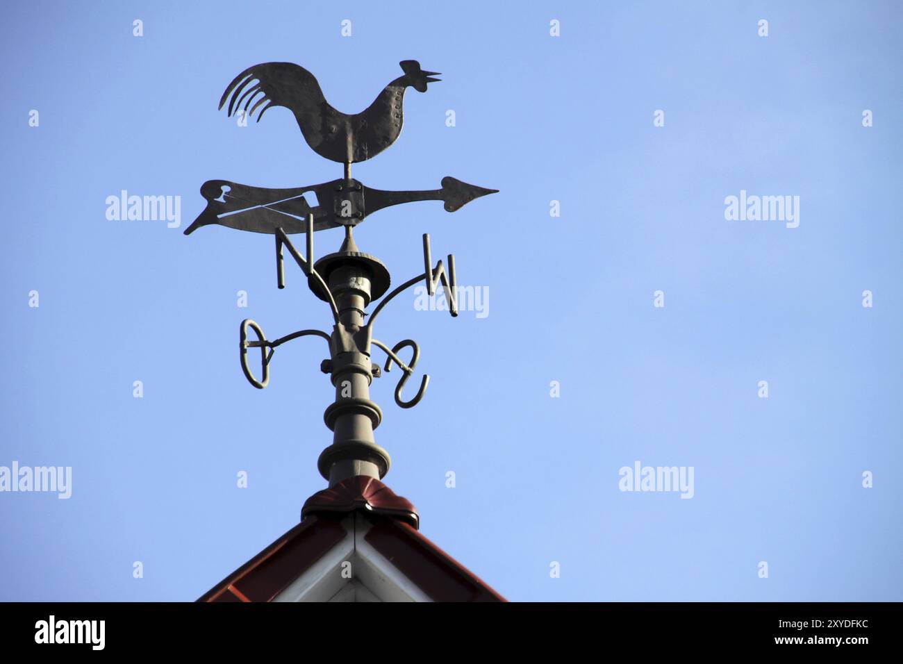 Weathercock on a roof in Lothe Stock Photo - Alamy