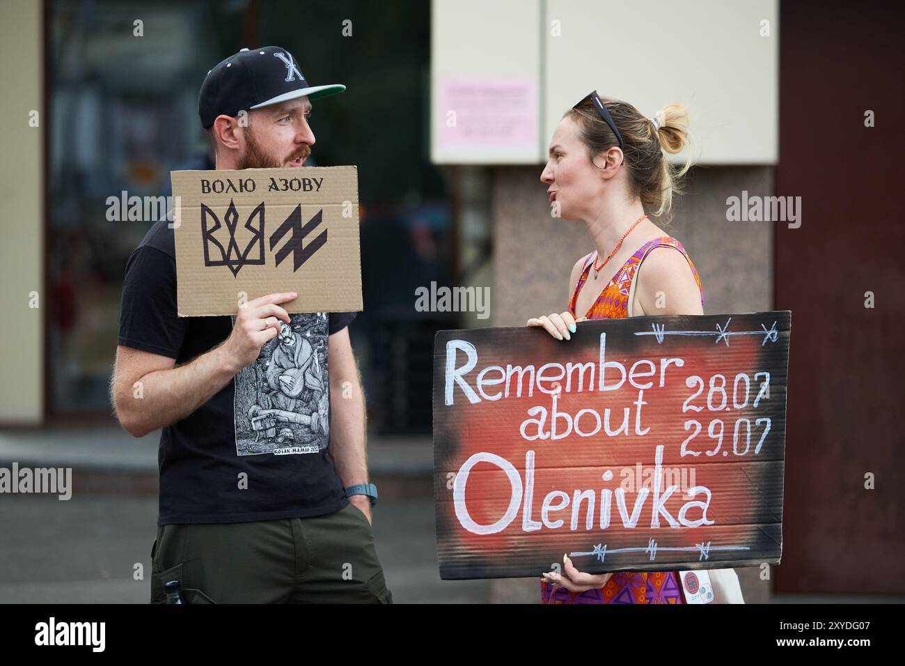 Ukrainian activists demonstrating with banners dedicated to captured ...